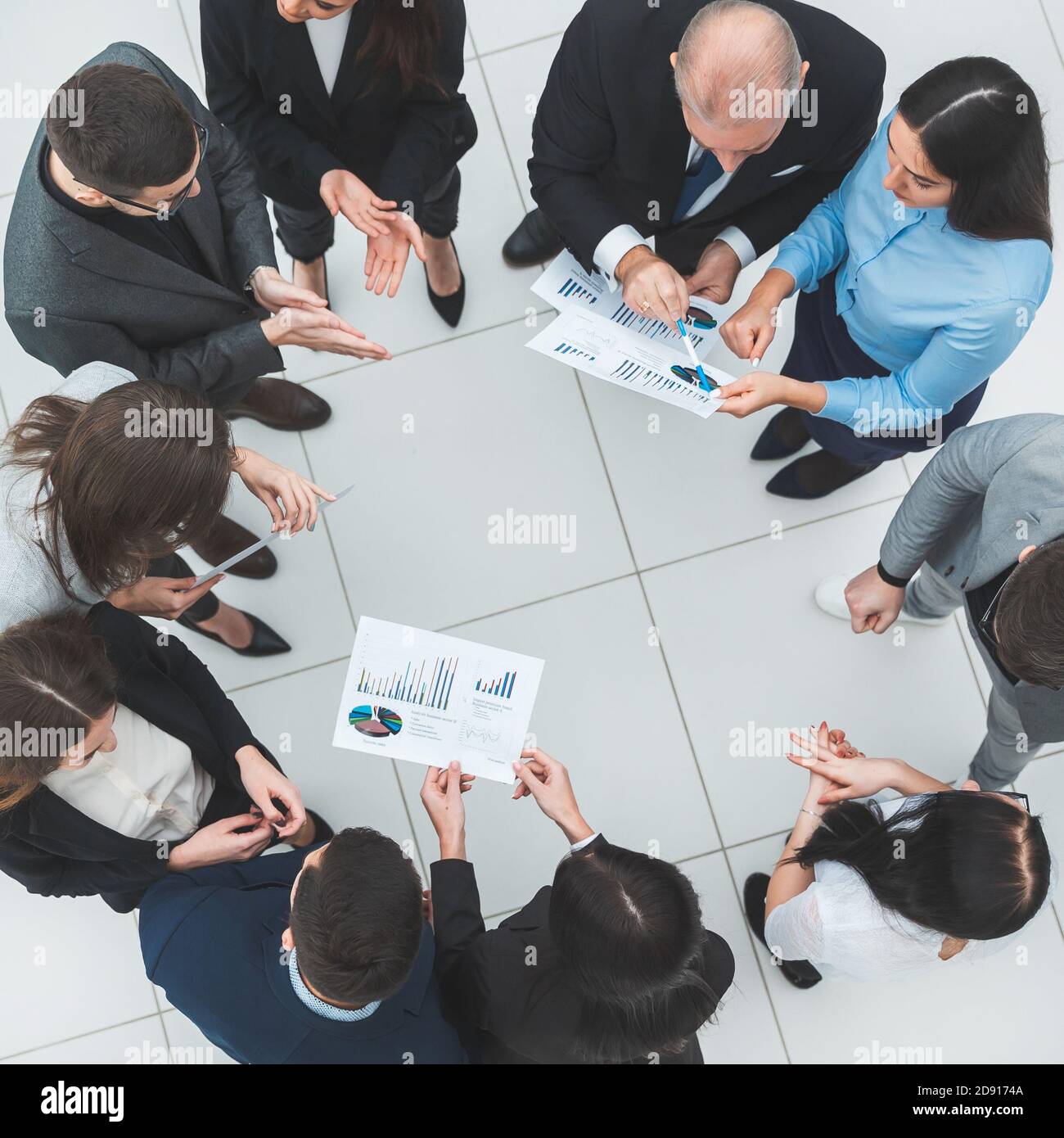 Building employees men blueprint hi-res stock photography and images ...