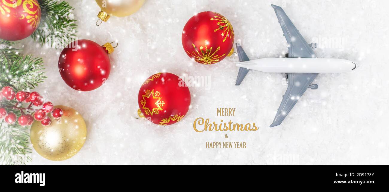 Travel for Christmas. Airplane with Christmas decor. Selective focus ...