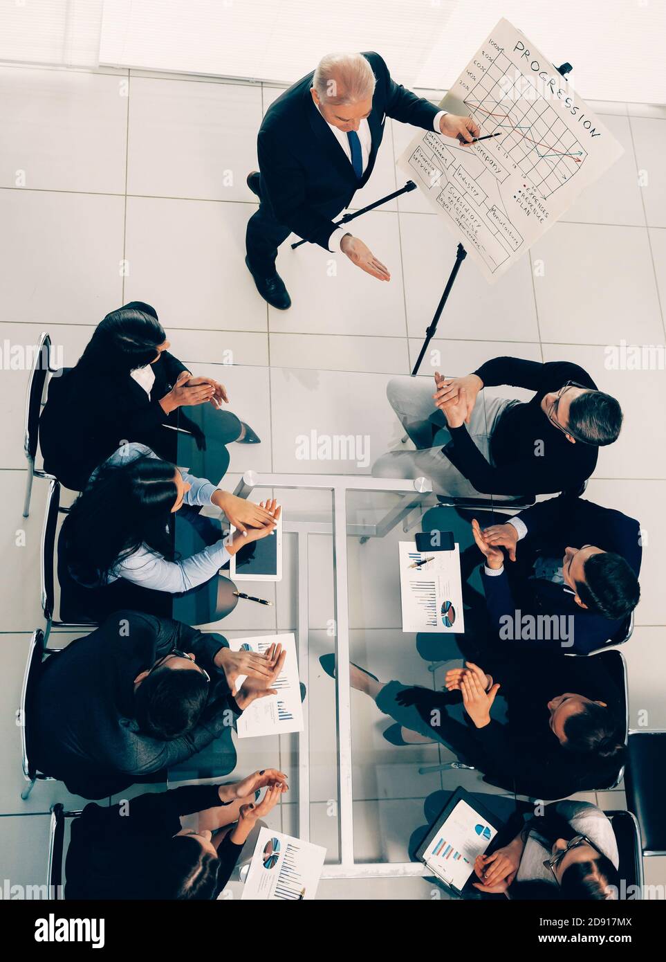top view. boss at a meeting with the business team Stock Photo - Alamy