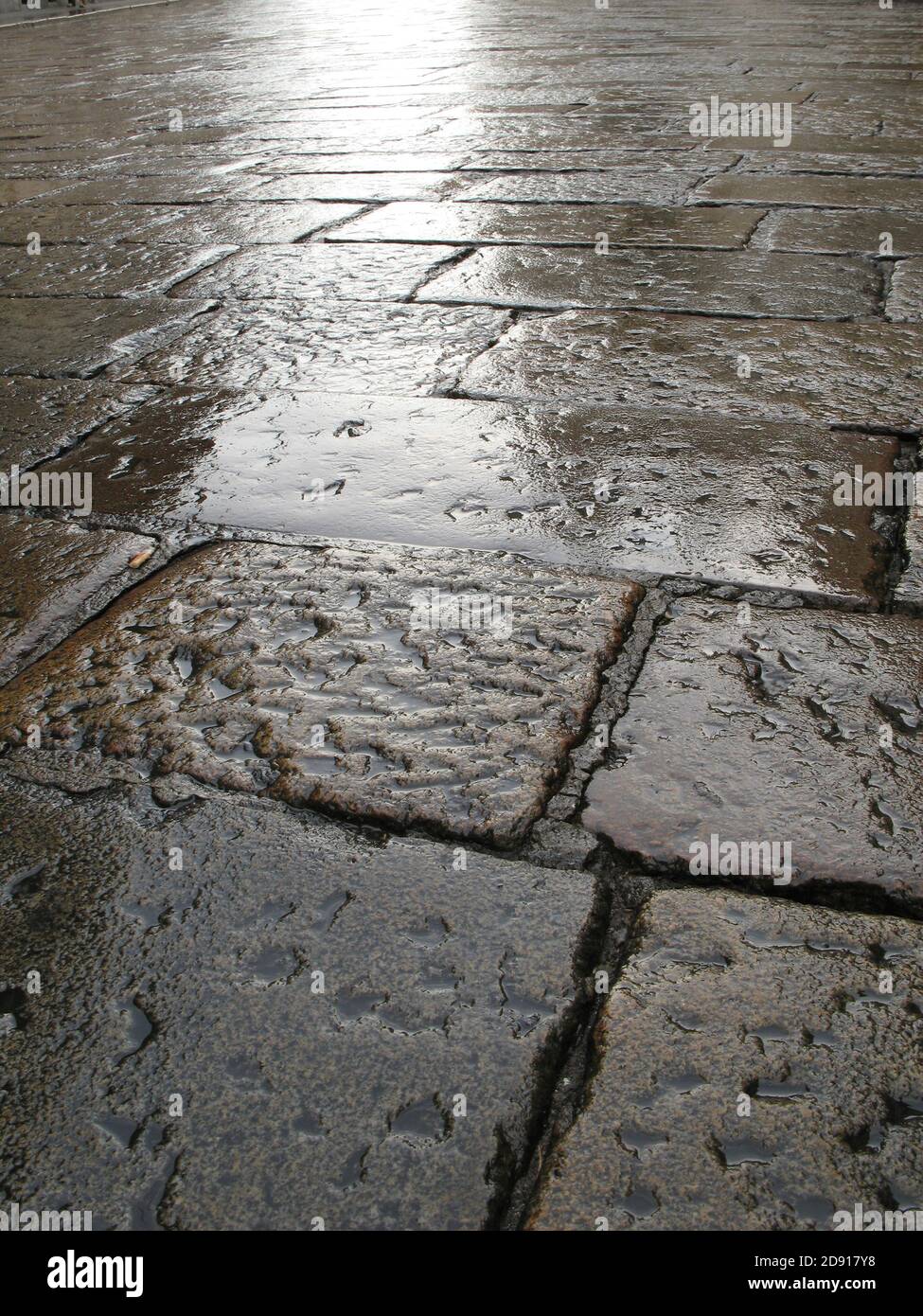 cobblestone texture of an ancient road of Milano after the rain Stock ...