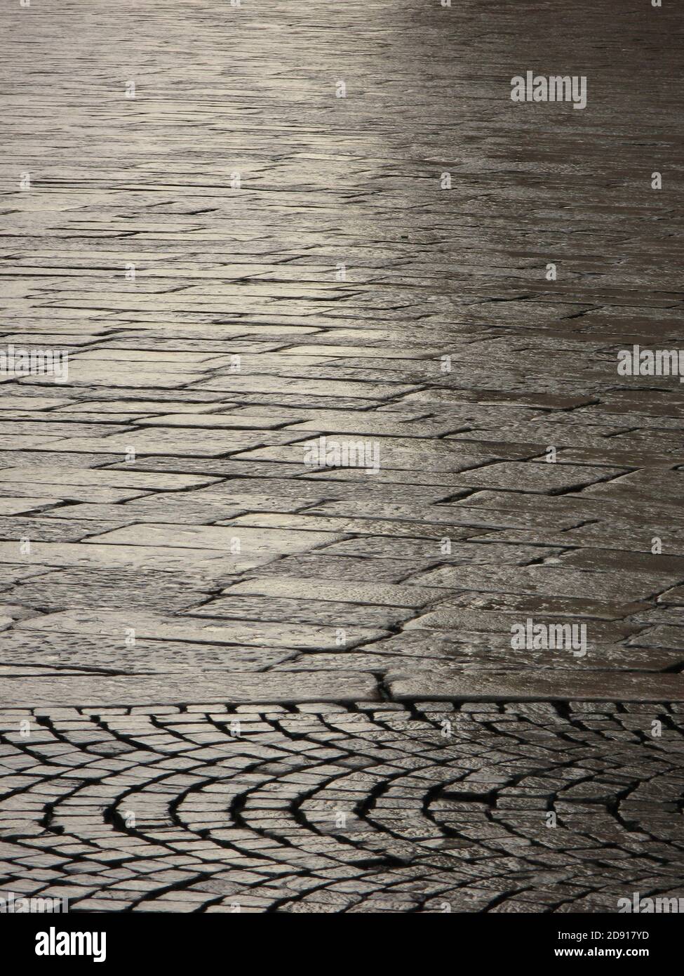 cobblestone texture of an ancient road of Milano after the rain Stock ...
