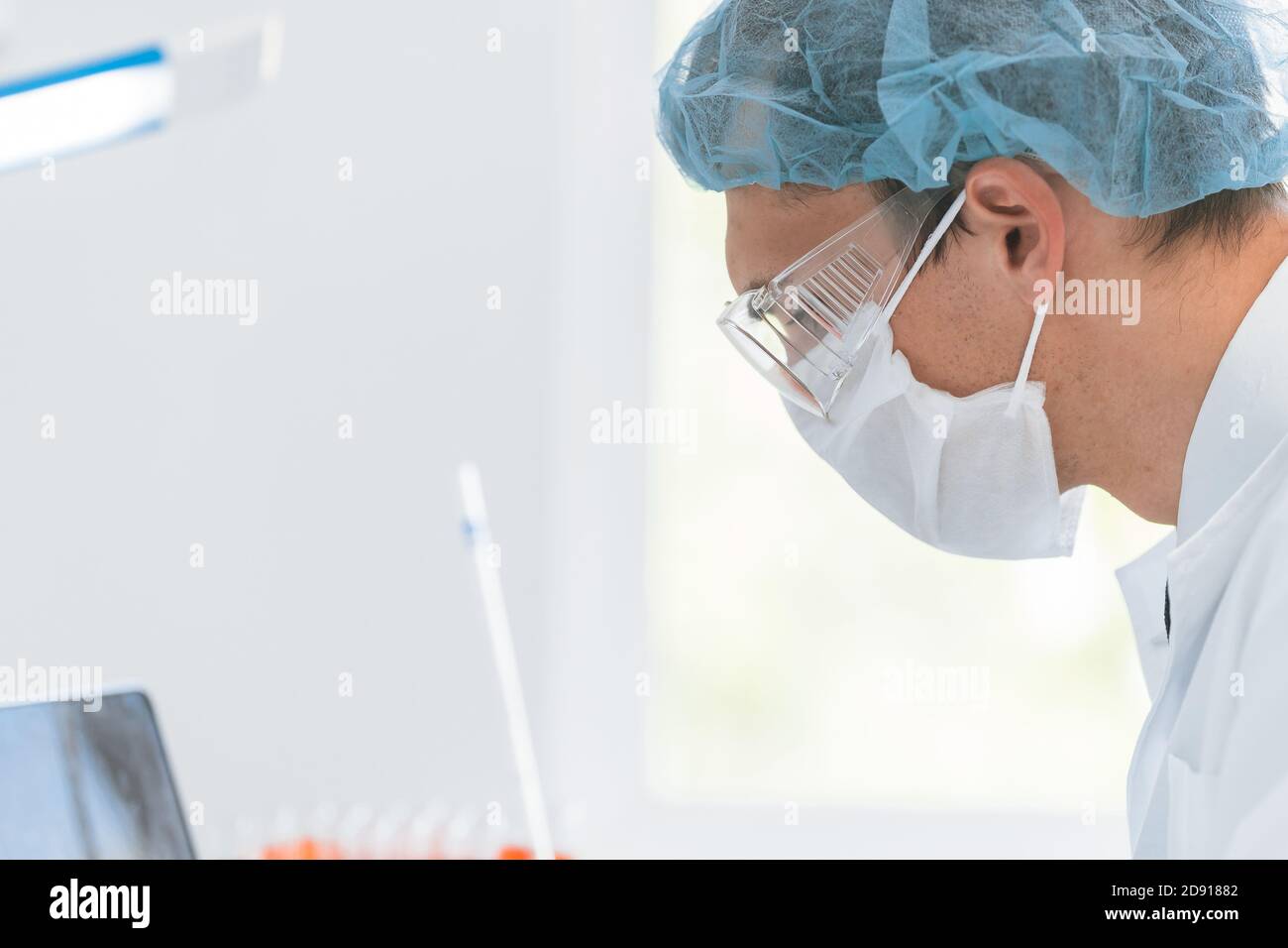 group of scientists analyzing tests in the laboratory Stock Photo - Alamy