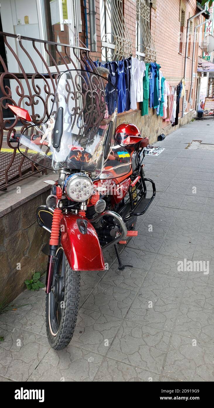 Old retro motorcycle clothing seller on the street Stock Photo - Alamy