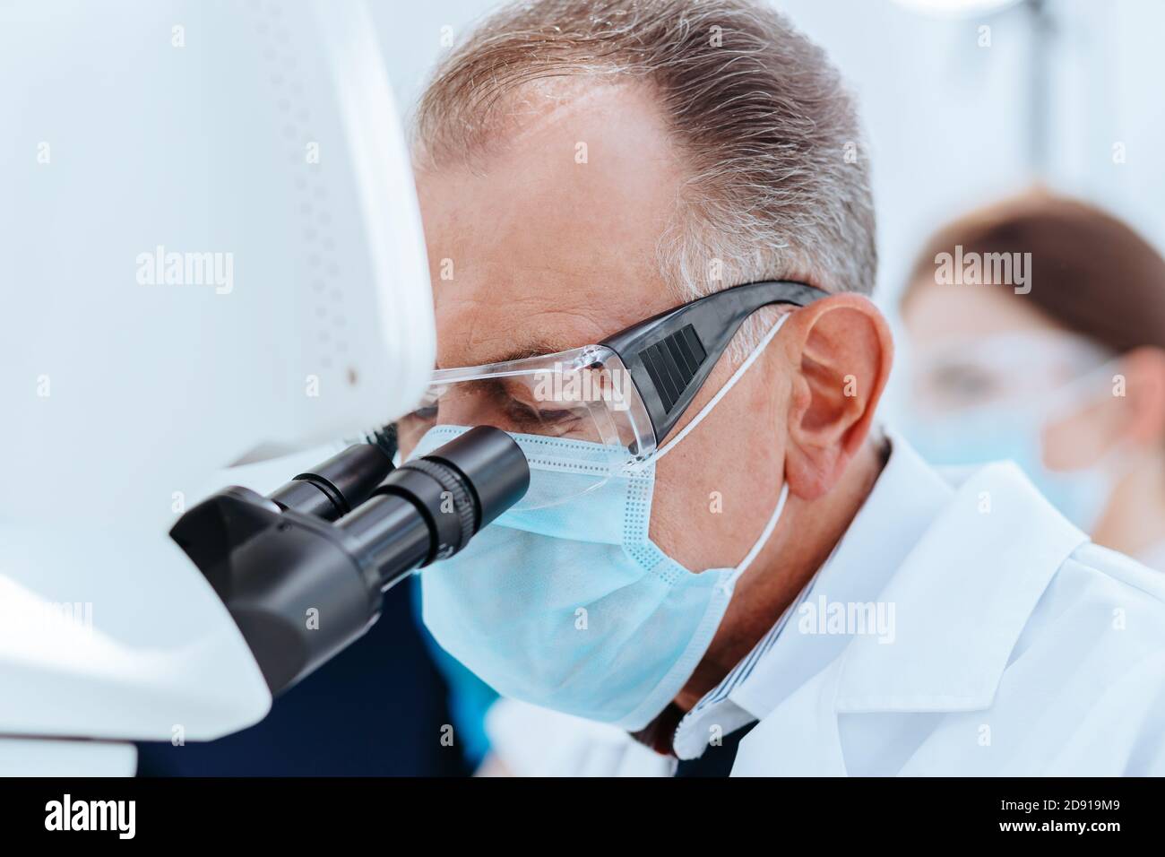 Looking Through Microscope High Resolution Stock Photography and Images ...