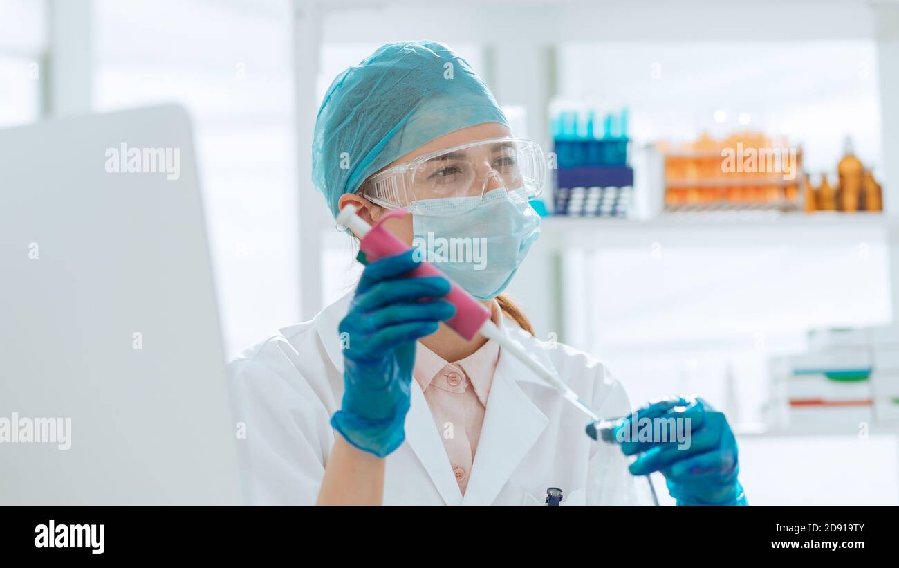 Female doctor conducts medical research hi-res stock photography and ...