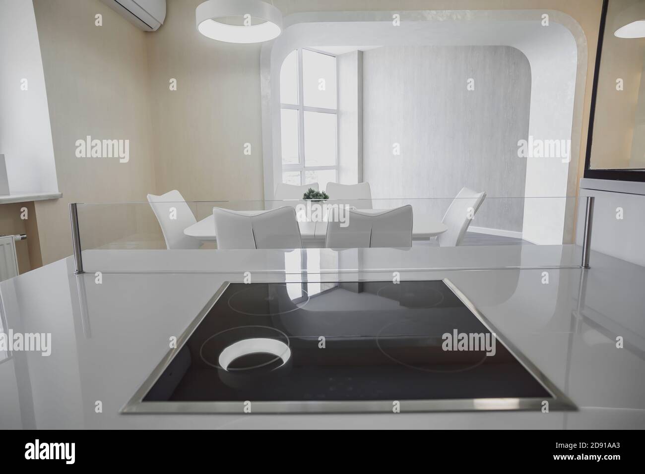 Modern electric stove surface in white light kitchen close up Stock ...