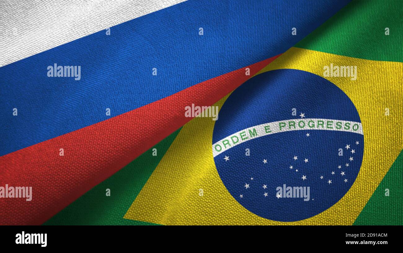 Russia and Brazil two flags textile cloth, fabric texture Stock Photo ...