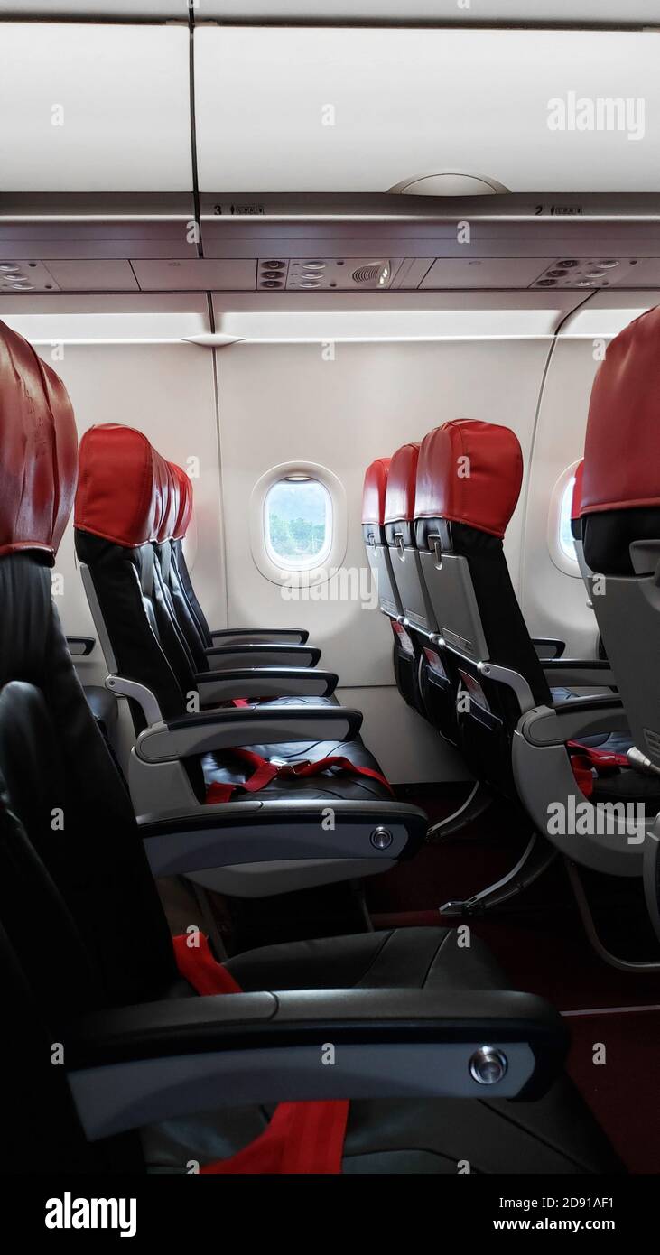 Deserted aircraft interior, empty passenger seats Stock Photo - Alamy