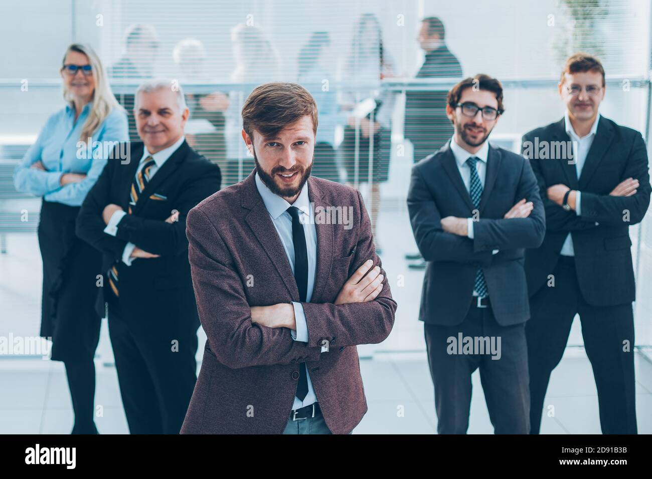 group of leading experts standing in the office Stock Photo - Alamy