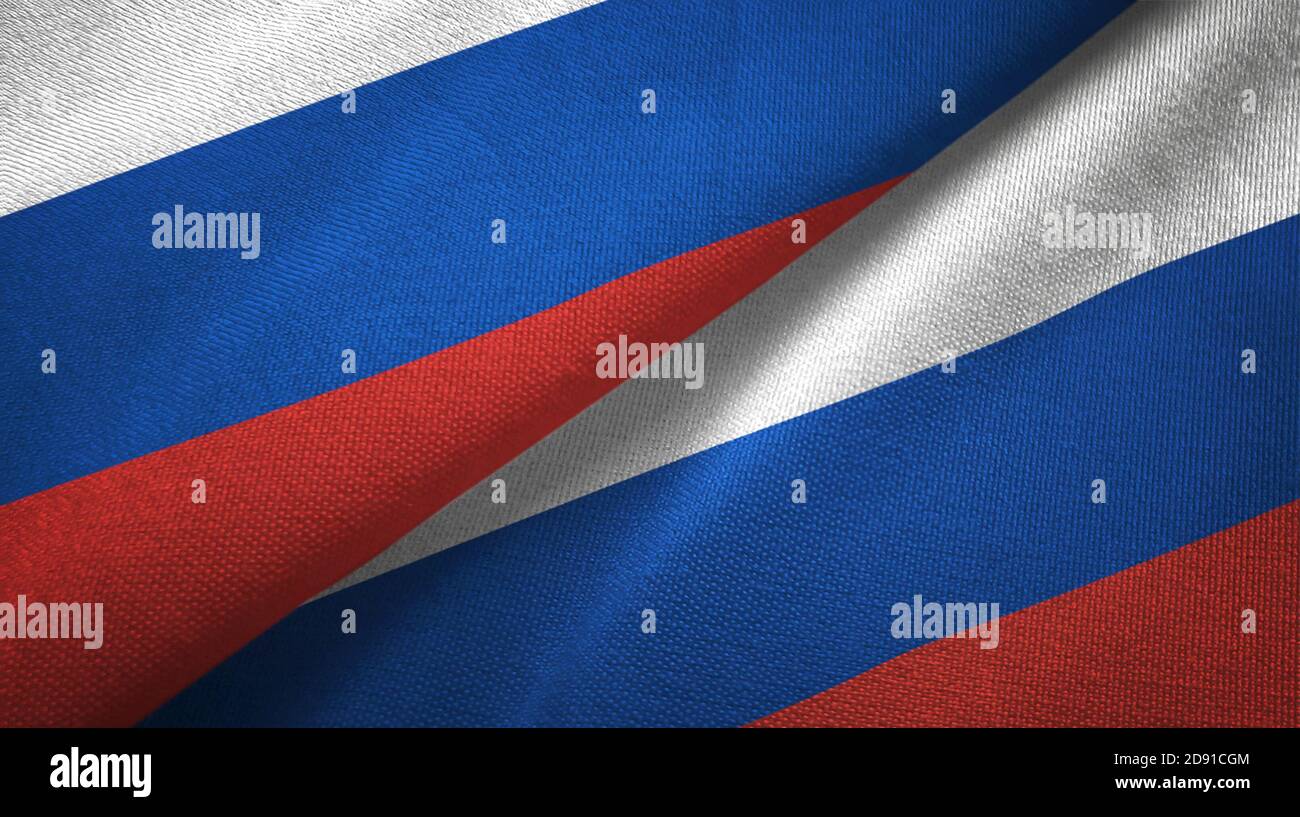 Russia and Russia two flags textile cloth, fabric texture Stock Photo ...
