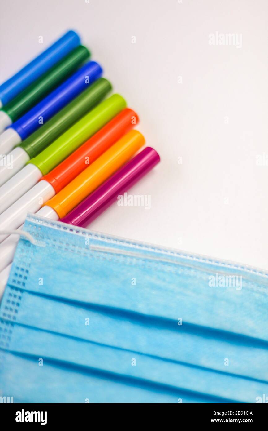 Color pencil and mask with light background Stock Photo - Alamy