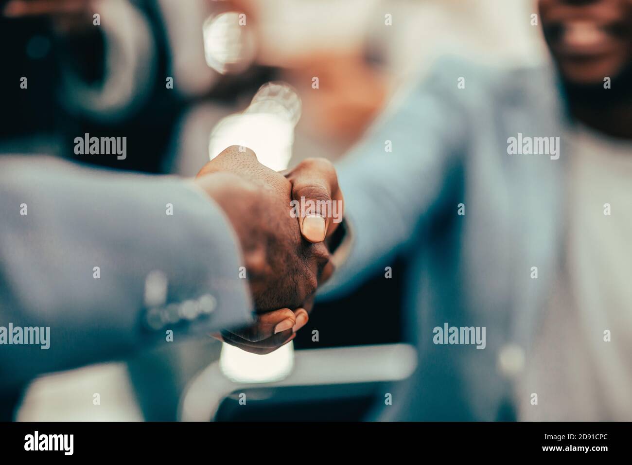 close up. background image of a handshake of young entrepreneurs Stock ...