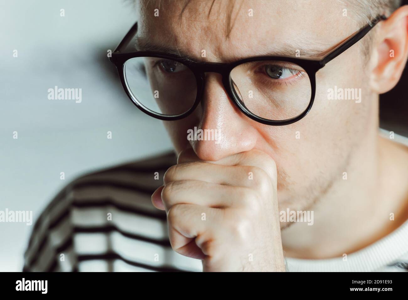Thoughtful male entrepreneur wear glasses thinking, solving problem ... Thoughtful male entrepreneur wear glasses thinking, solving problem ...