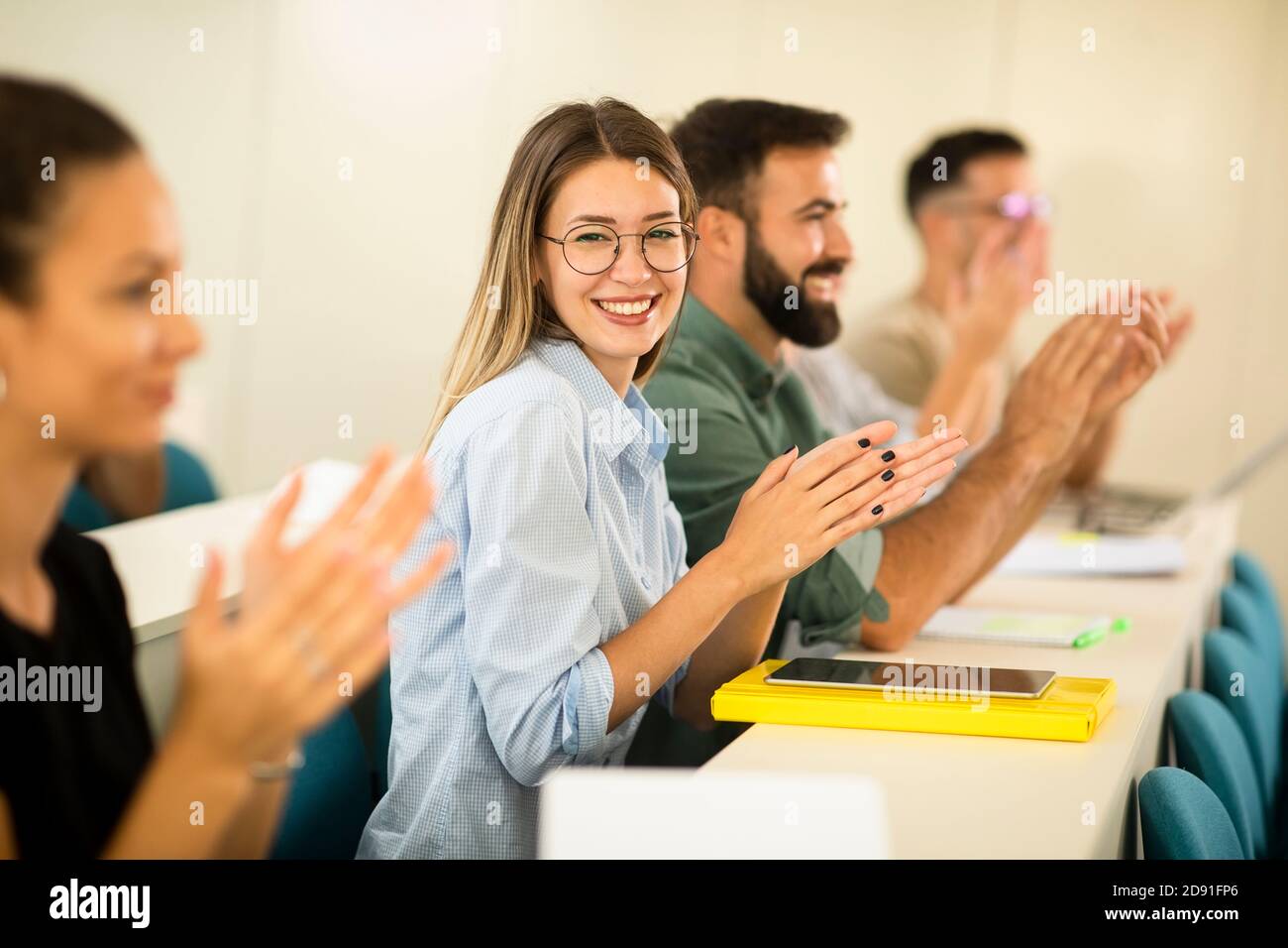 Group of university students in the classroom Stock Photo - Alamy