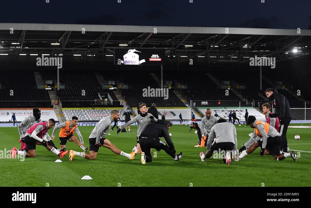 Fulham warm up on the pitch before the Premier League match at Craven ...