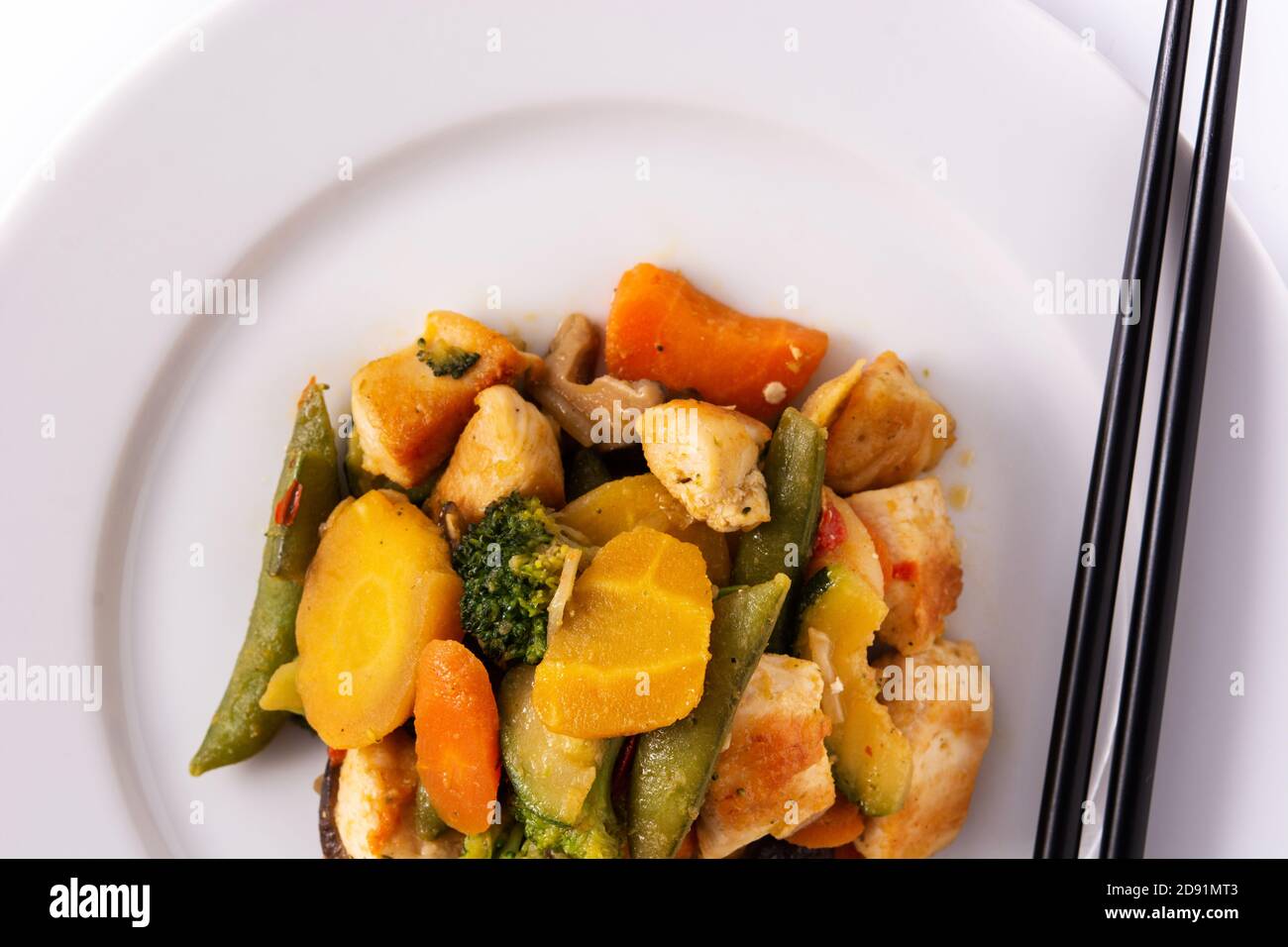 Stir fry chicken with vegetables isolated on white background Stock ...