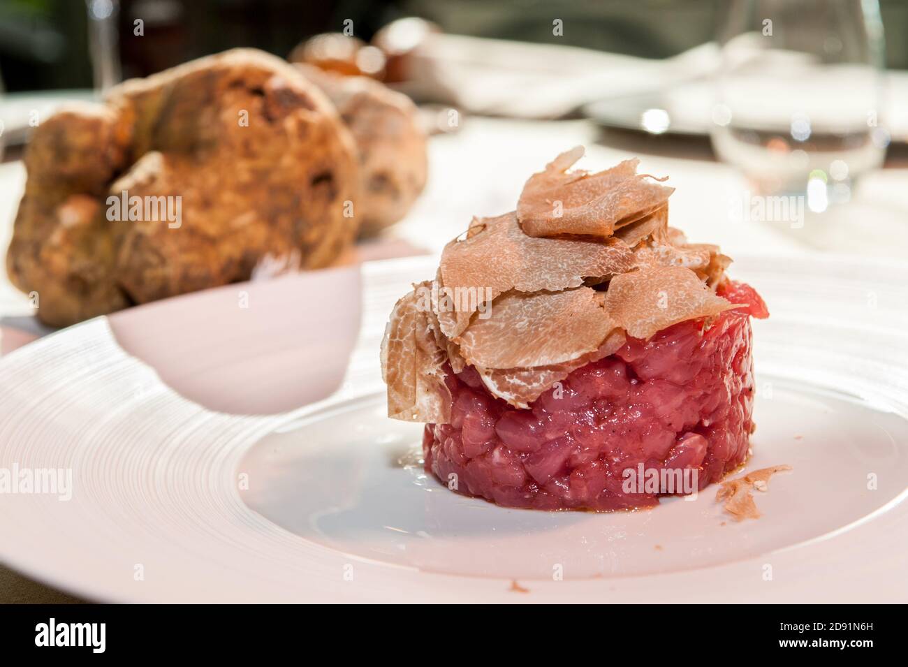 Alba white truffle sliced on raw minced meat from Piedmontese Fassona ...