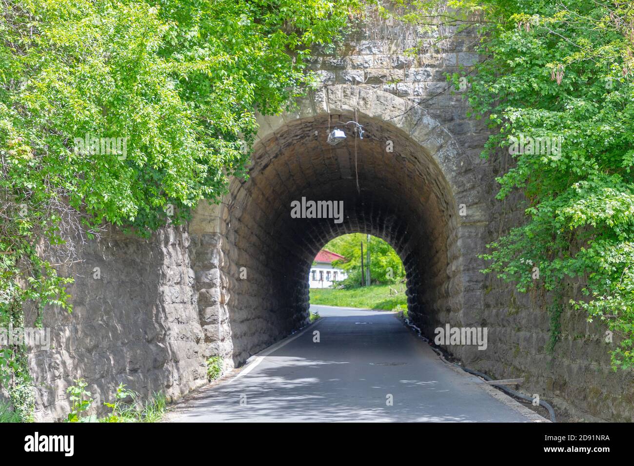 Short and Narrow Road Tunnel Passageway Stone Arch Stock Photo - Alamy