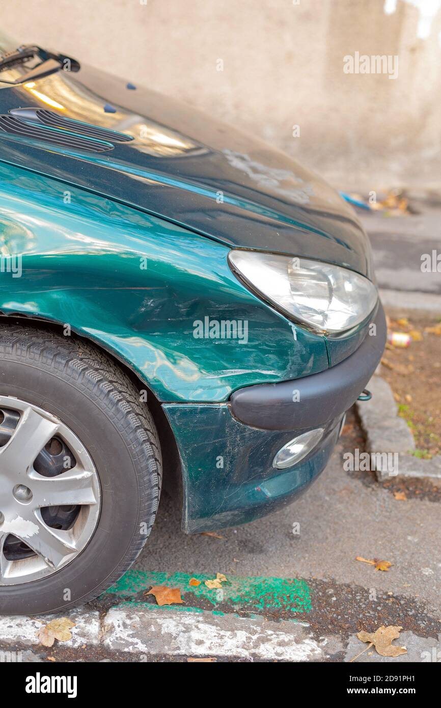 Small Green Car Front Collision Traffic Accident Damage Stock Photo - Alamy