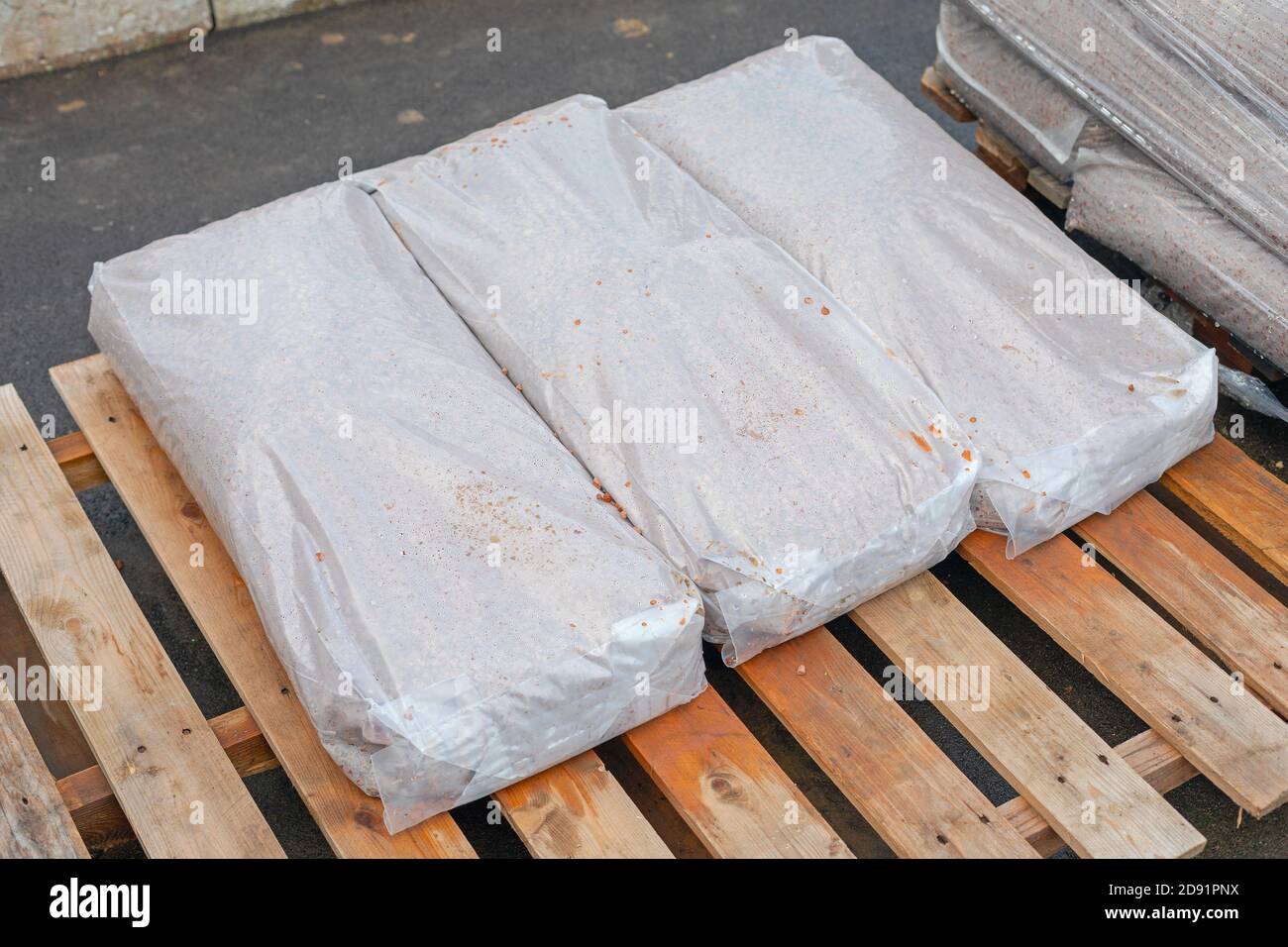 Heavy Material Delivery in Sacks at Cargo Pallets Stock Photo - Alamy