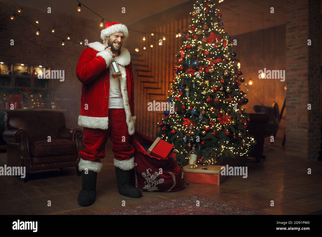 Bad drunk Santa claus brings gifts, nasty party Stock Photo - Alamy
