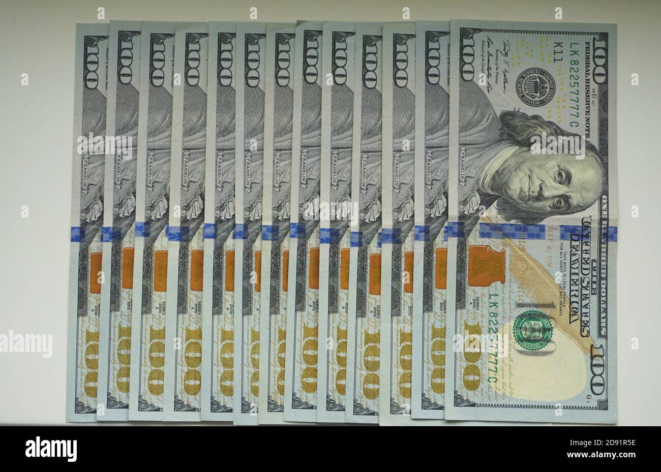 Lots Of 100 US Dollar Bills In A Line Pile Of Old One Hundred Dollar lots-of-100-us-dollar-bills-in-a-line-pile-of-old-one-hundred-dollar