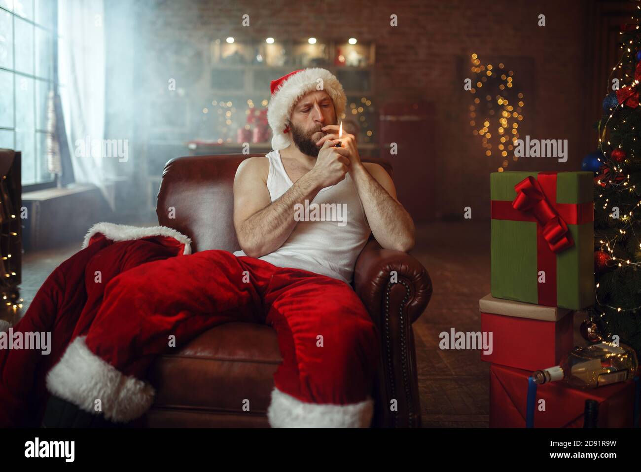 Bad Santa claus smoking cigar on sofa, nasty party Stock Photo - Alamy