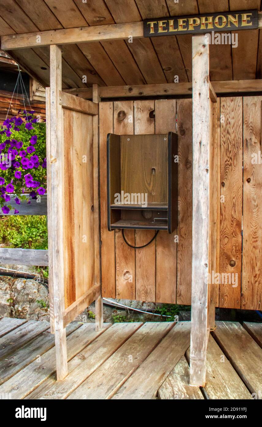 Rustic wooden telephone booth with phone missing in Desolation Sound, B ...