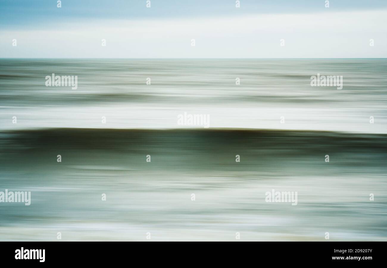 Intentional camera movement of ocean wave Stock Photo - Alamy