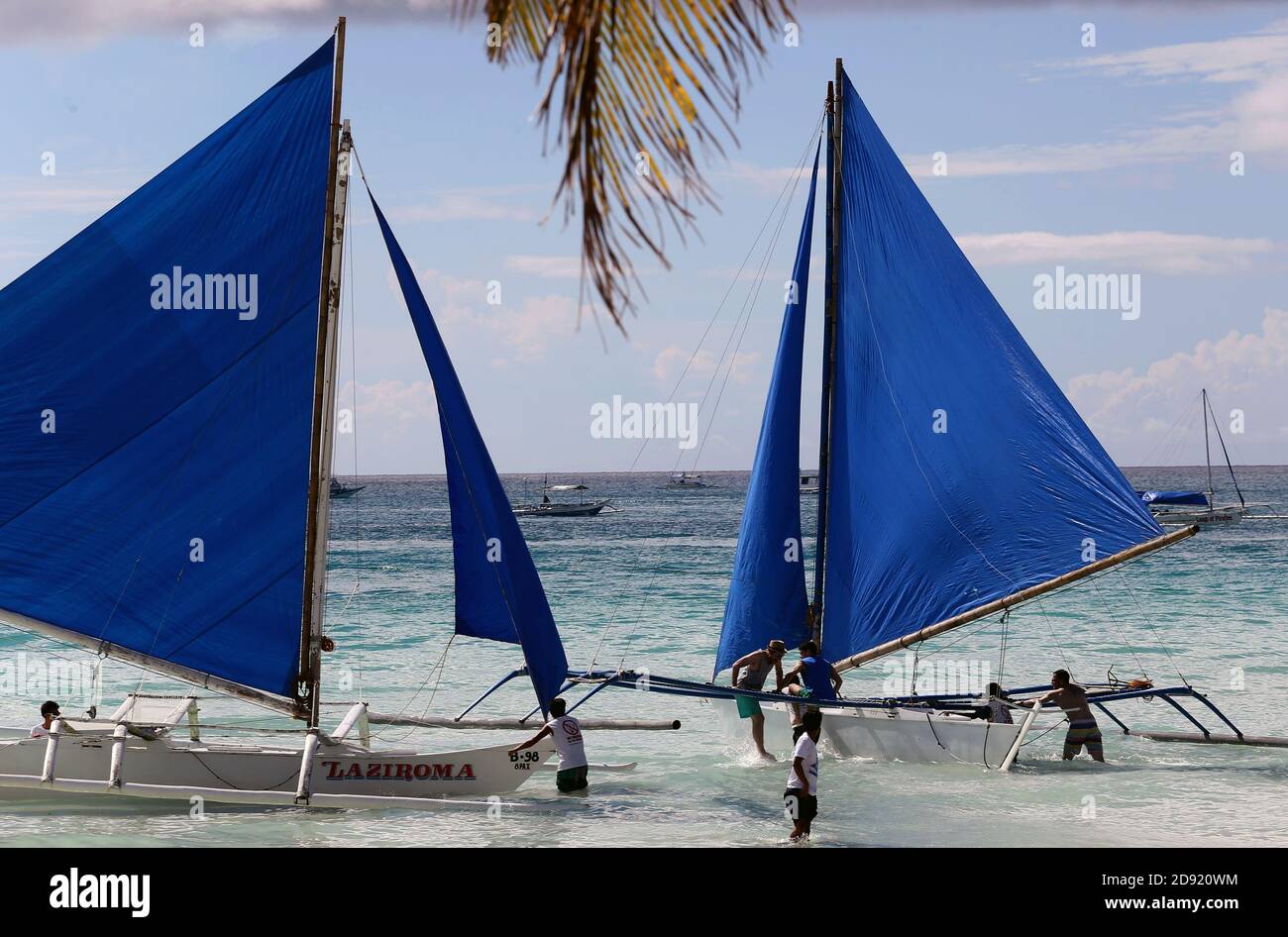 Small sailing boats at the sunset. Boracay, Philippines Stock Photo - Alamy