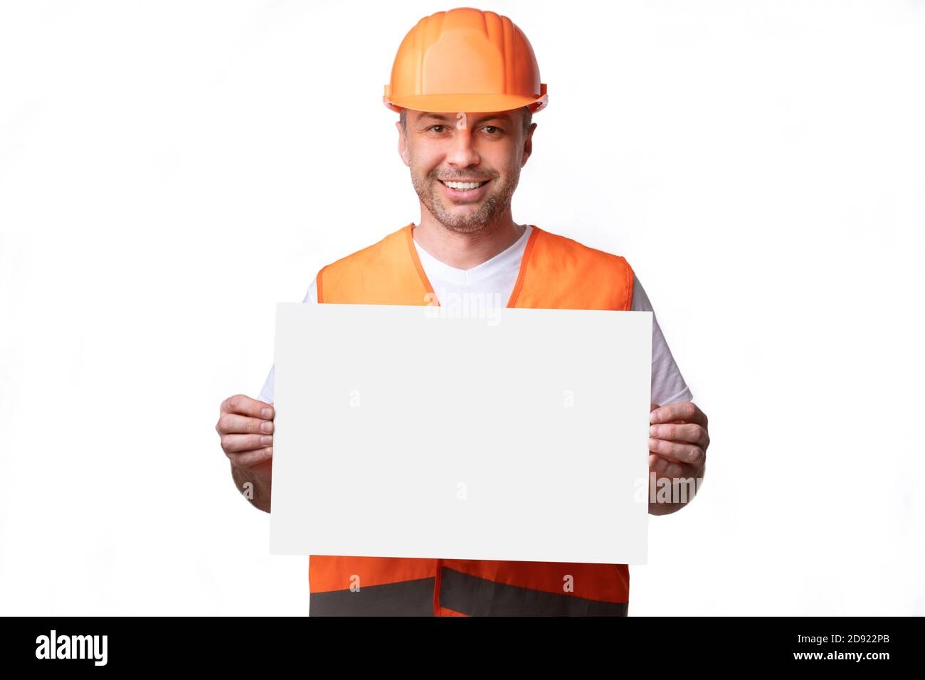 Construction Worker Showing Empty Poster Board Standing On White ...