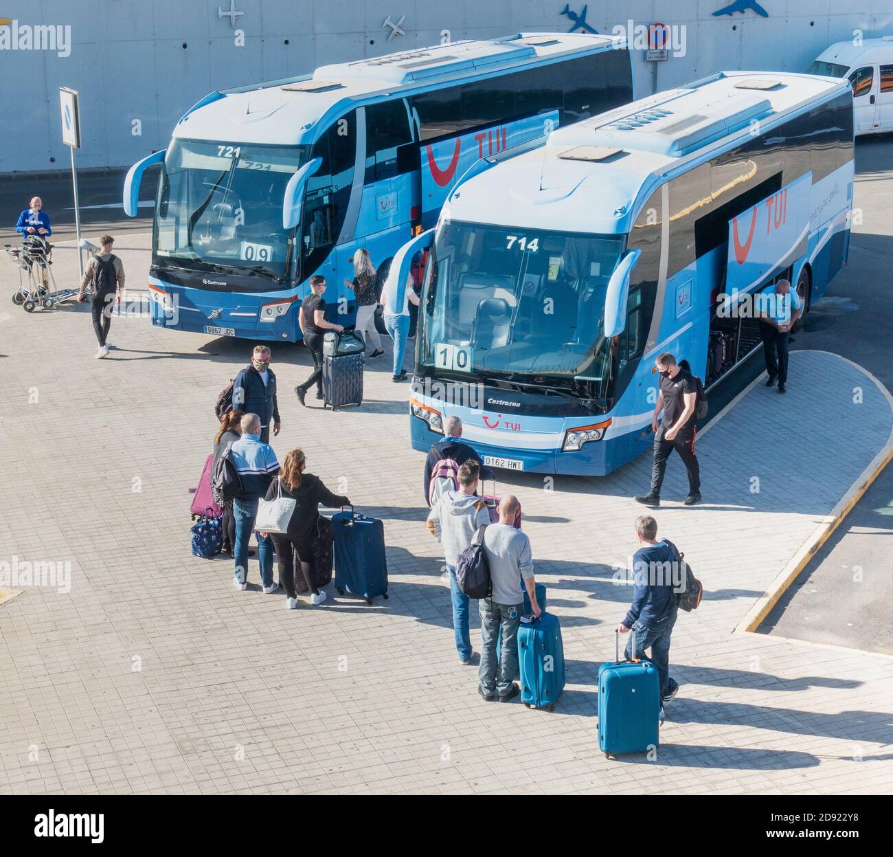 TUI clients, tourists boarding coaches at Gran Canaria airport. Canary ...