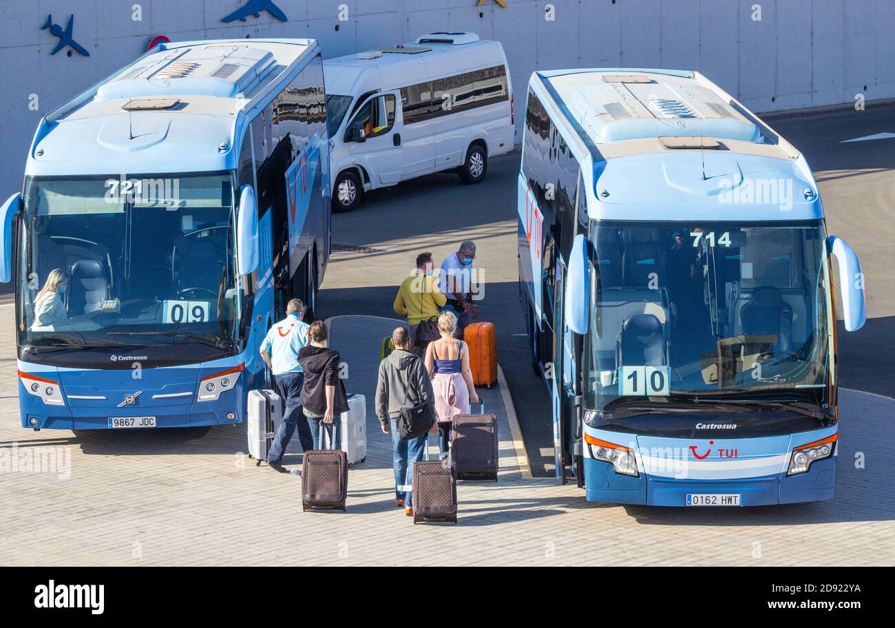 TUI clients, tourists boarding coaches at Gran Canaria airport. Canary ...