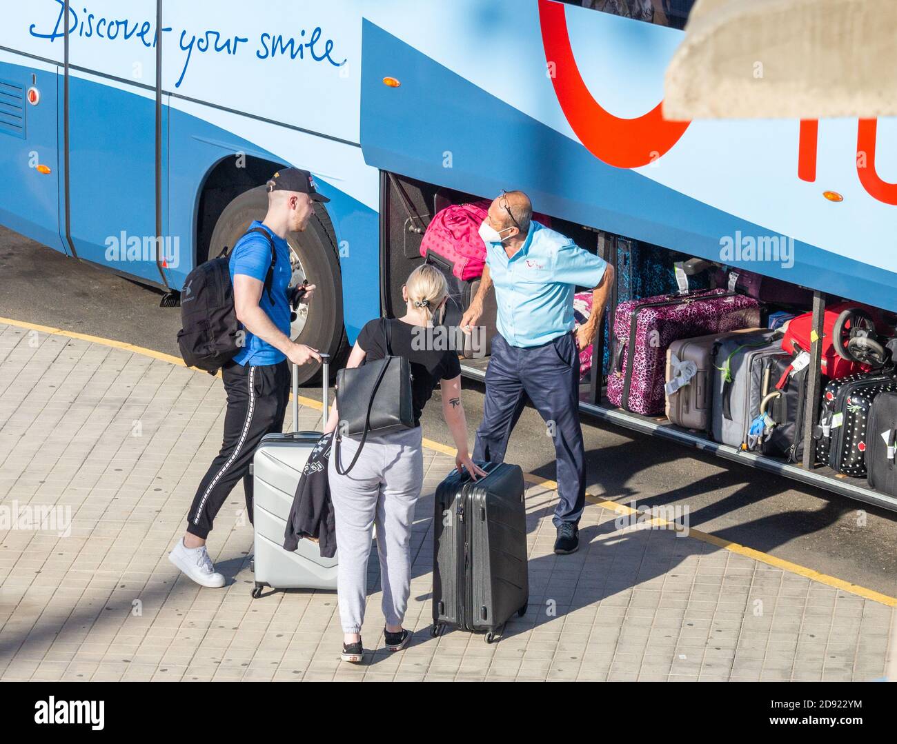 TUI clients, tourists boarding coaches at Gran Canaria airport. Canary ...