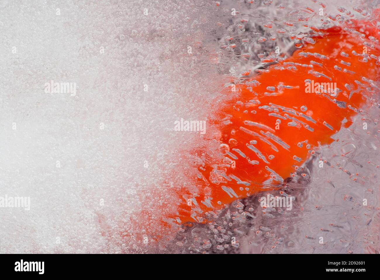 Red chilli frozen in ice no 02 Stock Photo - Alamy