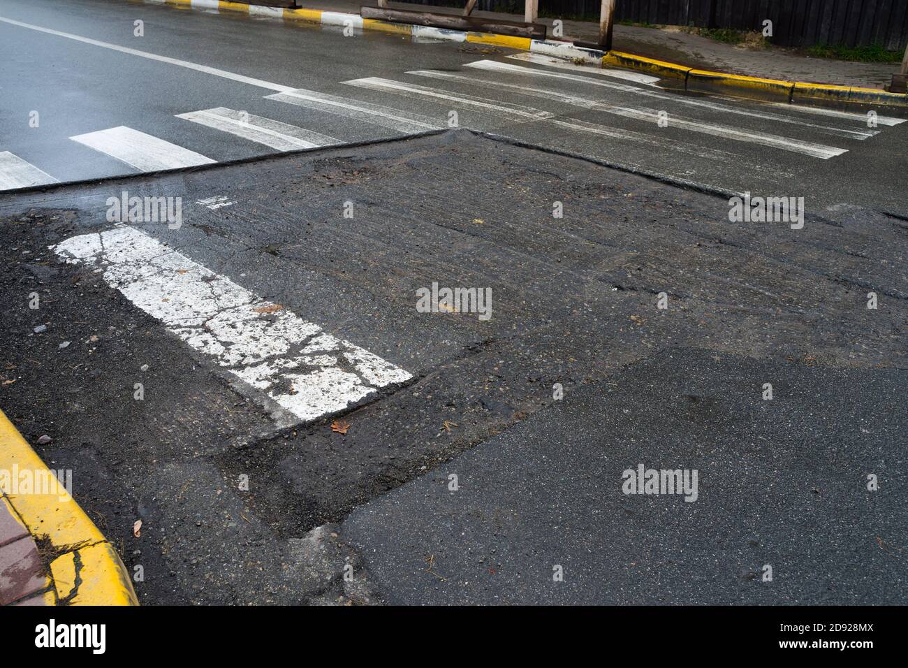 Partial repair crosswalk. Preparation for cladding of bad roads Stock ...