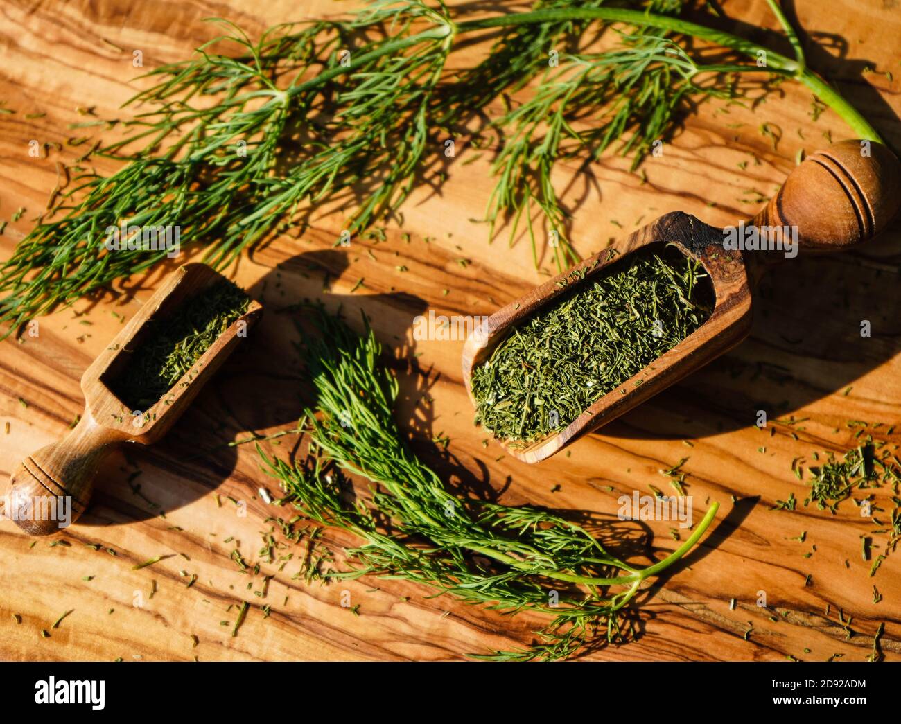 Dill Anethum graveolens on olive wood Stock Photo - Alamy