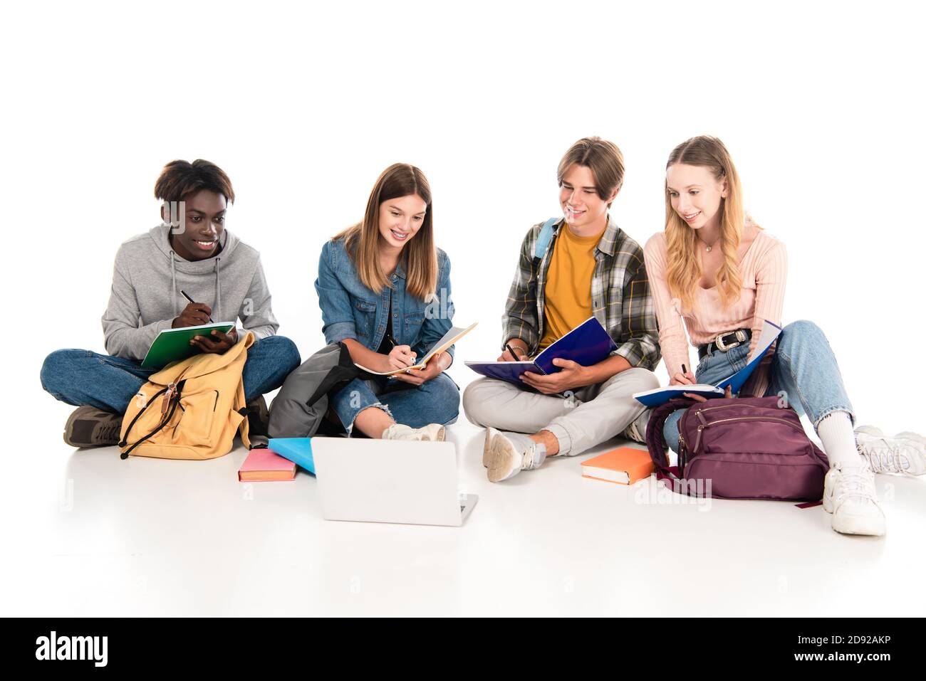 African american teen boy writing Cut Out Stock Images & Pictures - Alamy