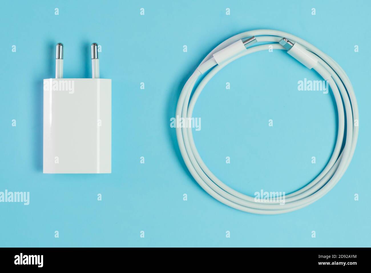 A white smart phone charger cable with lightning hi speed USB A ...
