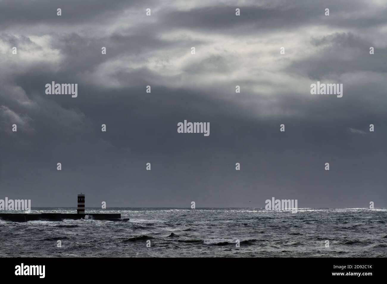 Autumn seascape before rain and storm. Pier and beacon from northern ...