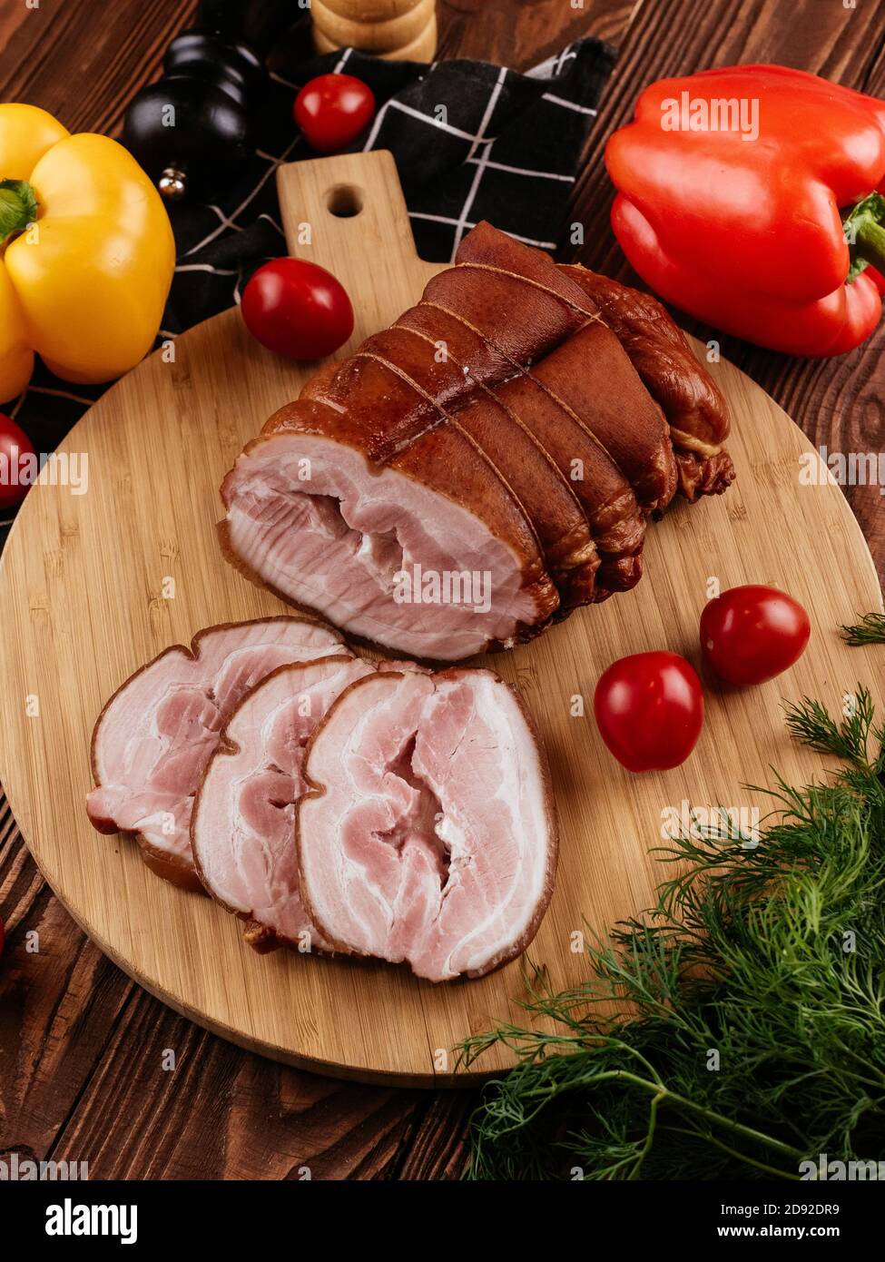 ham sliced on a background with vegetables and spices Stock Photo - Alamy