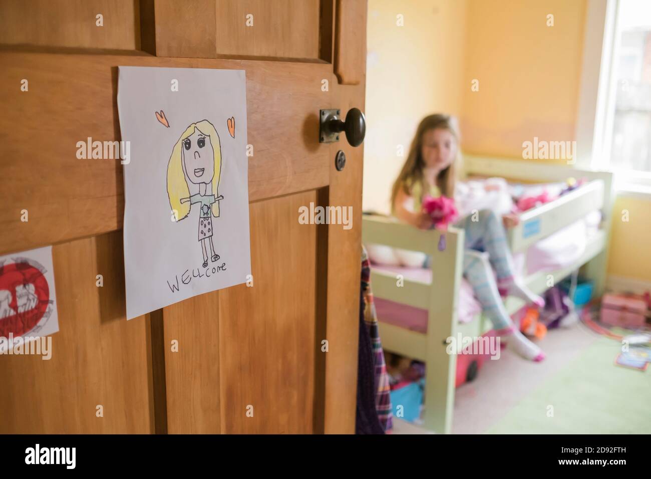 Hand drawn welcome sign on young girls bedroom door Stock Photo - Alamy