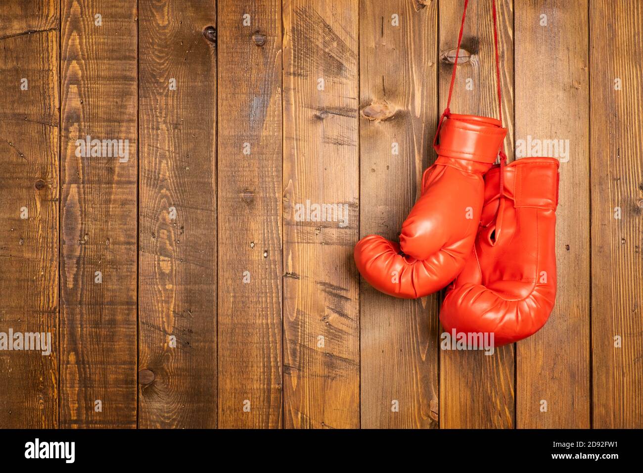 red boxes on a wood background Stock Photo - Alamy