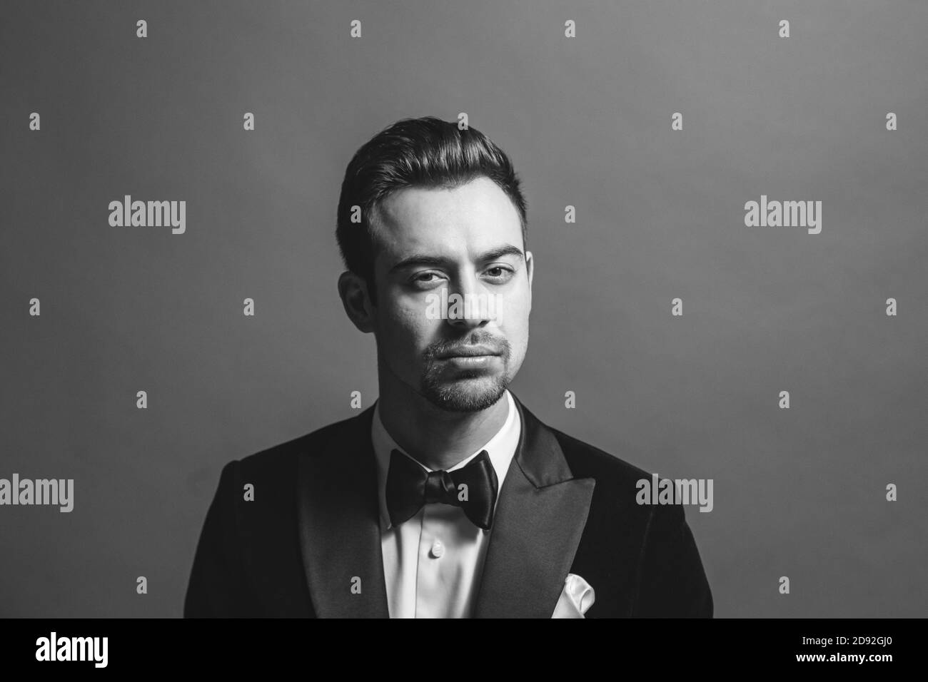 Young executive plain background Black and White Stock Photos & Images ...