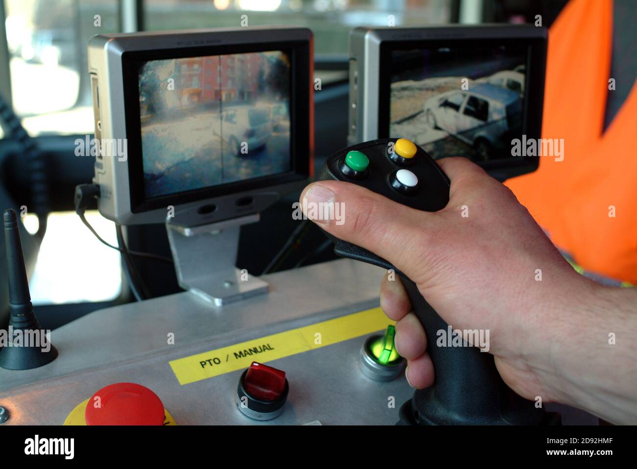 Male hand maneuver a joystick with remote control cameras Stock Photo ...