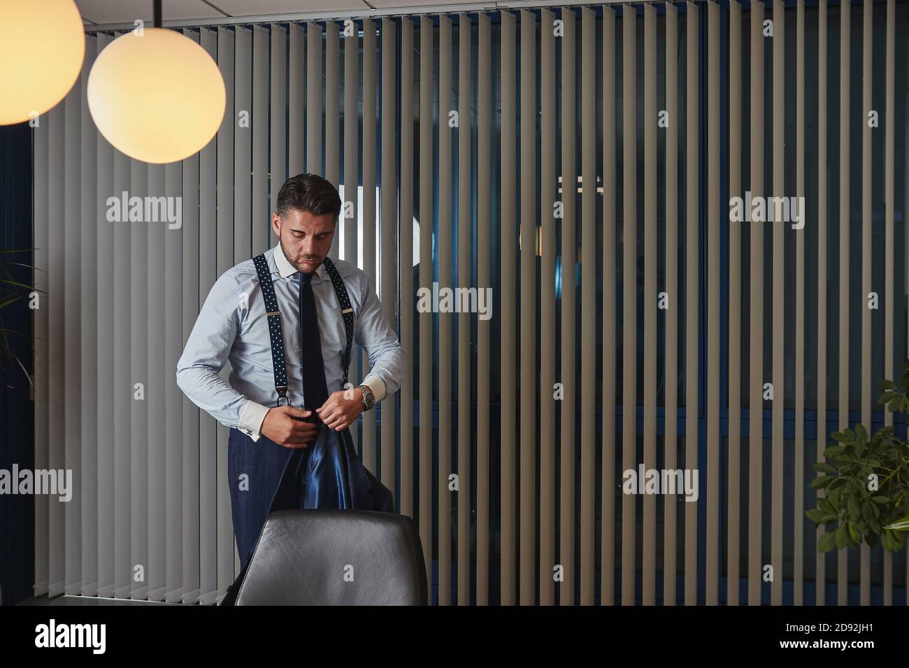 Taking Off Jacket High Resolution Stock Photography and Images - Alamy