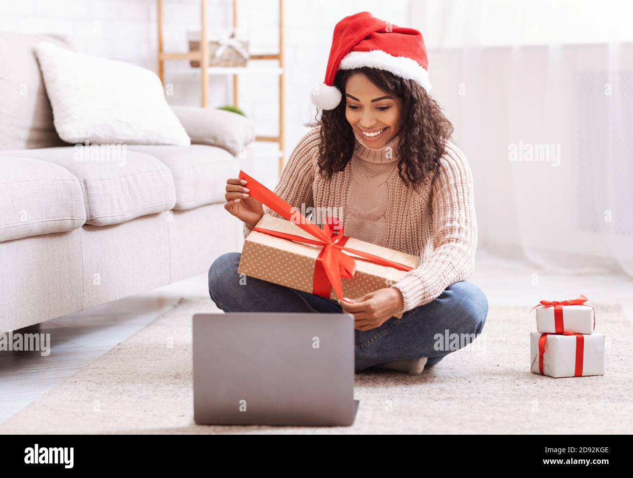 Black Lady Opening Present Box And Using Laptop Computer Stock Photo ...