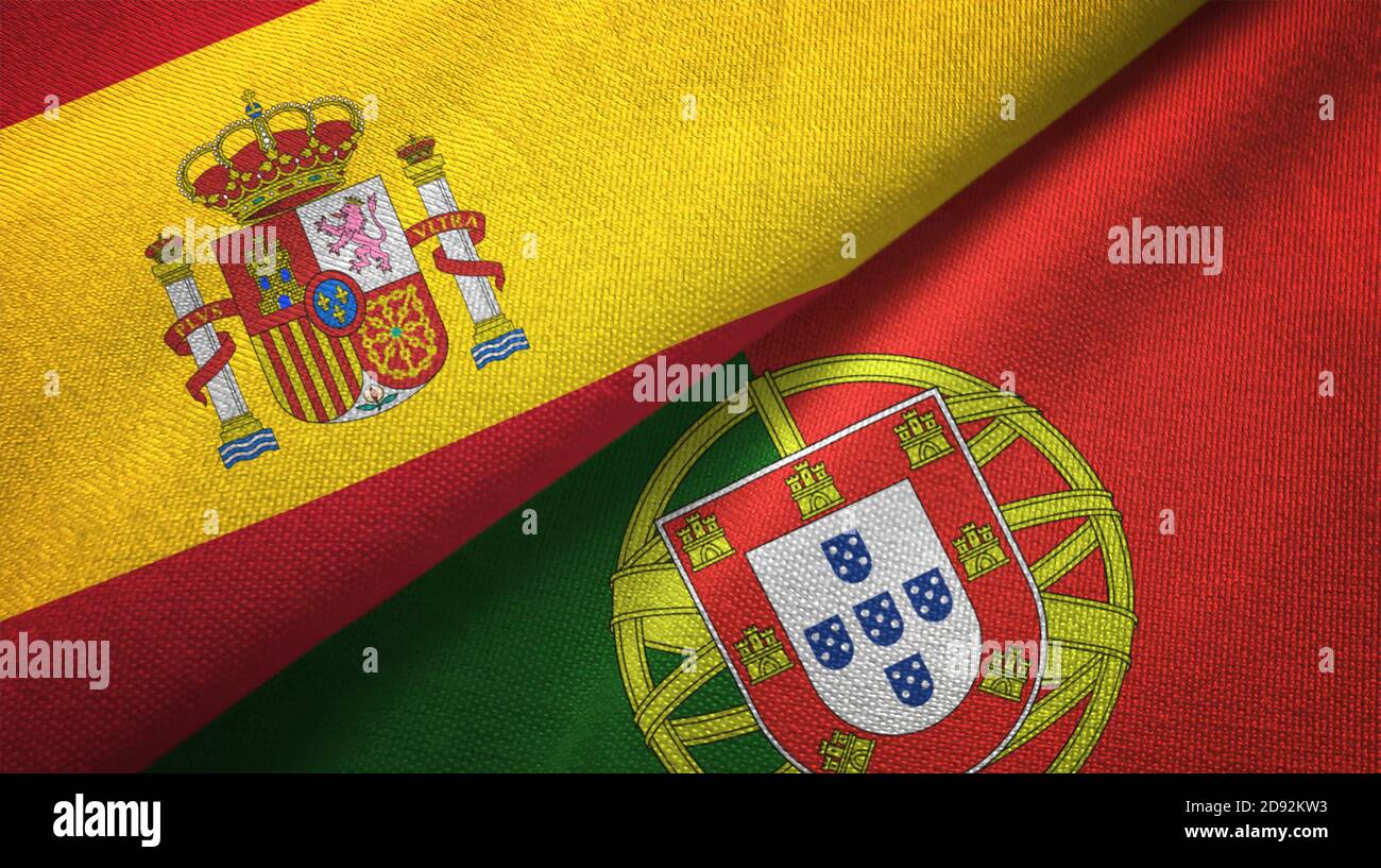 Spain and Portugal two flags textile cloth, fabric texture Stock Photo ...