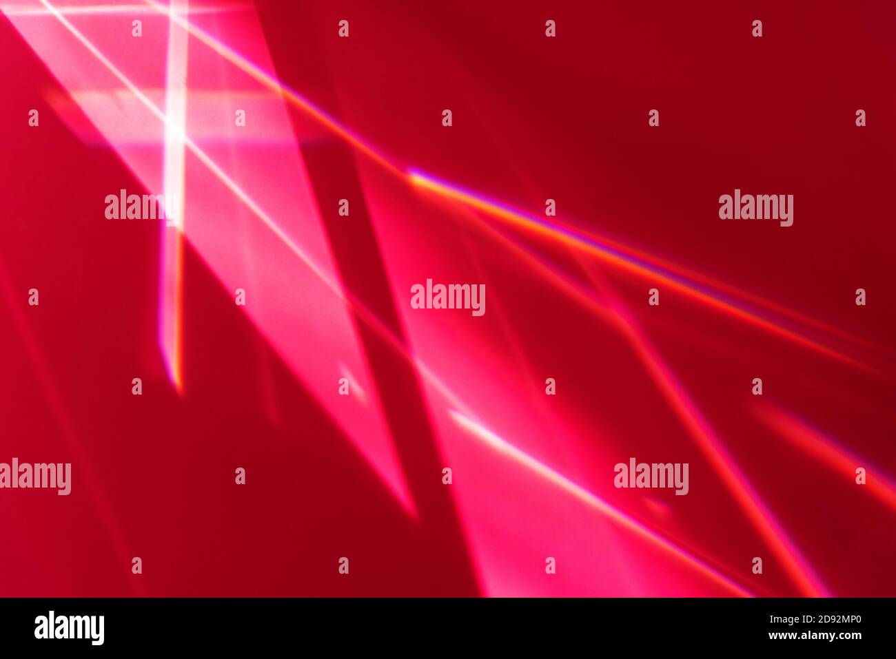 Blinding sun beams and glimmering rays on red Stock Photo - Alamy