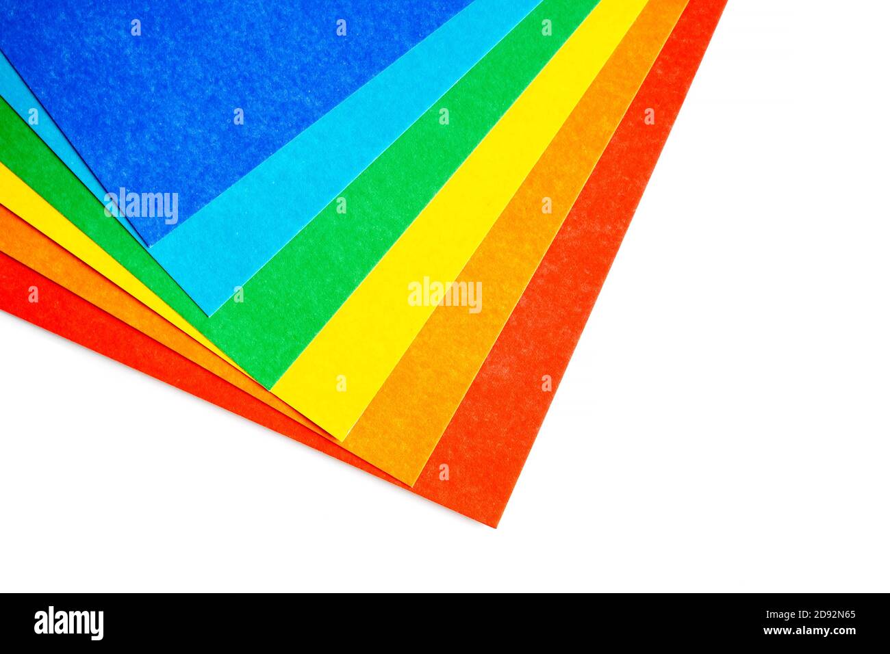 Composition of various colorful sheets of cardboard on a white ...